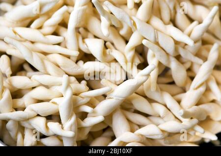 Closeup of trofie twisted pasta shapes Stock Photo - Alamy