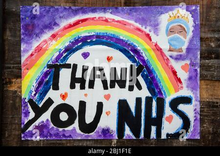 Thank the NHS drawings and paintings on a window in Kingston Hospital ...