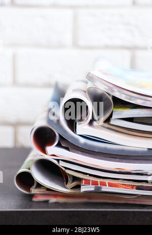 Stack of magazines on table, close up Stock Photo - Alamy