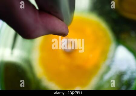 Mxing eggs with sugar , flour and butter to bake a cake Stock Photo - Alamy
