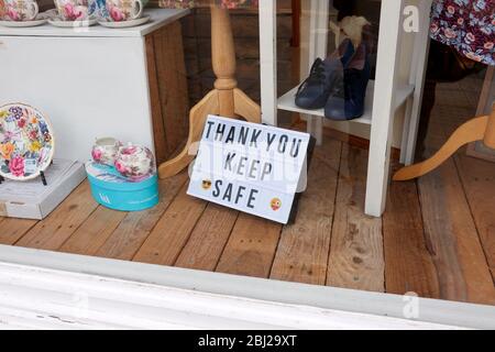 Thank you keep safe message with emojis in shop window Stock Photo - Alamy