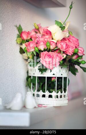 Beautiful rose in vase on shelf Stock Photo - Alamy