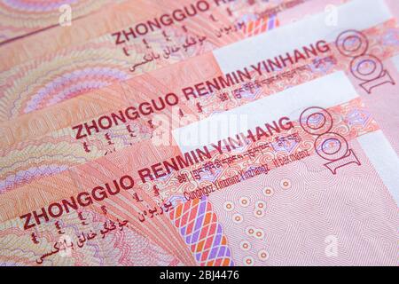 Part of Chinese yuan renminbi banknotes with words in Chinese which ...