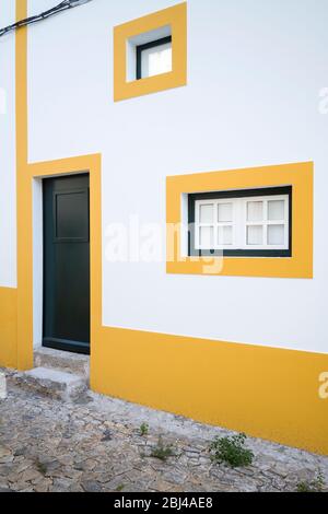 A minimalist dark green door in a modern building Stock Photo - Alamy