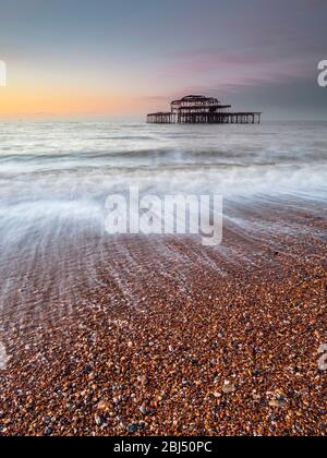 Dawn seascape shot of Brighton Pier and Colomns with long exposure ...