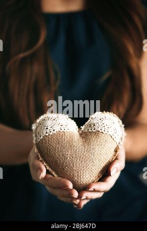 Decorative heart in female hands, isolated on white Stock Photo - Alamy