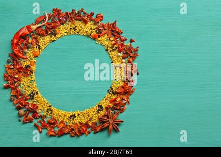 Ring of various spices on wooden background Stock Photo - Alamy