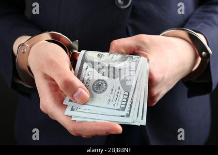 Man in suit handcuff prisoner jail police law legal trouble wrist hand ...