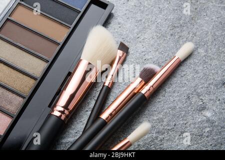 various makeup products on dark background with copyspace Stock Photo ...