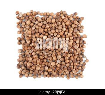 square food background - dried coriander seeds close up Stock Photo - Alamy