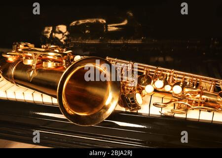 Piano and saxophone, closeup Stock Photo - Alamy