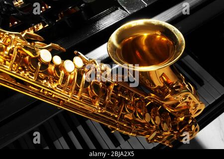 Piano and saxophone, closeup Stock Photo - Alamy