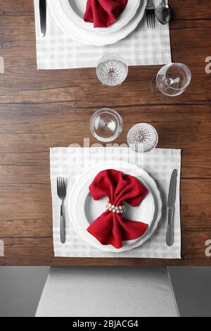 Elegant table appointments with red napkin Stock Photo - Alamy