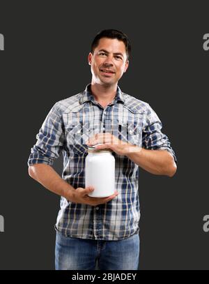 Portrait of happy milkman Stock Photo - Alamy