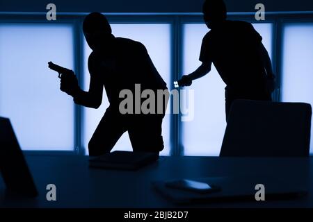 Armed thieves entering a house Stock Photo - Alamy