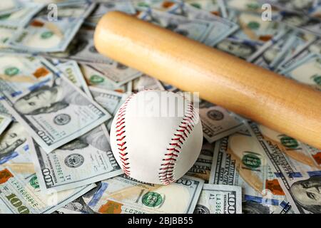 Baseball and bat on dollars background. Corruption concept Stock Photo ...
