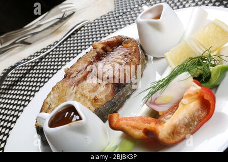 Fried Fish slice with Sauces Stock Photo - Alamy