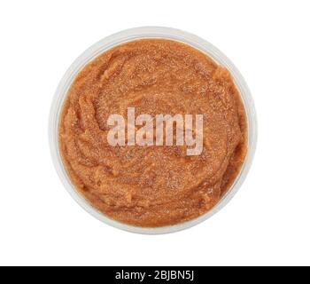 Natural scrub in container on white background Stock Photo - Alamy