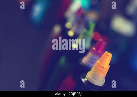 Multiple bottles with colorful inks for tattoo, close up view Stock ...