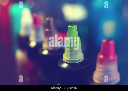 Multiple bottles with colorful inks for tattoo, close up view Stock ...