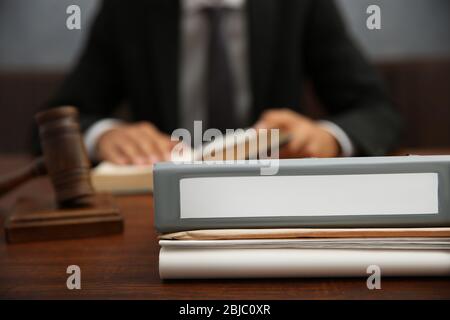 Folder on judge table, closeup Stock Photo - Alamy