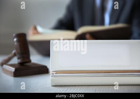 Folder on judge table, closeup Stock Photo - Alamy