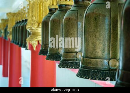 Traditional large old bells hanging in an english church tower from the ...