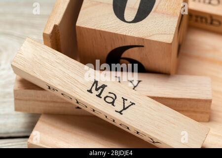 top view of plans lettering arranged of wooden cubes on blue background ...