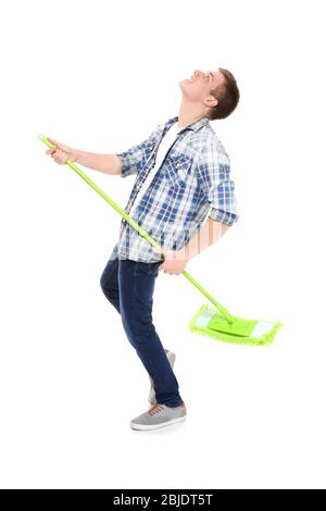 Young service man holding mop on white background Stock Photo - Alamy