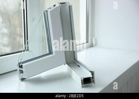 Sample of window profile on windowsill Stock Photo - Alamy