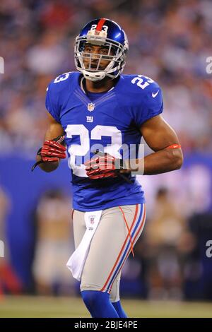 Corey Webster of the New York Giants breaks up a pass to Roddy White of ...