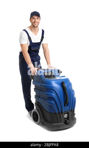 Dry cleaner's employee with special equipment on white background Stock ...