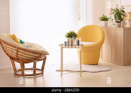 Beautiful modern veranda with cozy armchairs and coffee table Stock ...