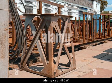 Metal supports for vessels in dockyard Stock Photo - Alamy