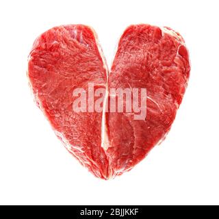 Fresh raw meat in shape of heart and blood splatters Stock Photo - Alamy