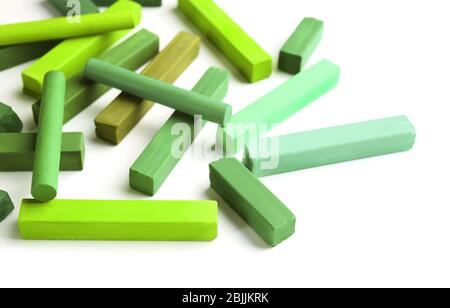 Bright green chalk on white background Stock Photo - Alamy