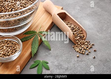 Composition with hemp seeds on grey background Stock Photo - Alamy