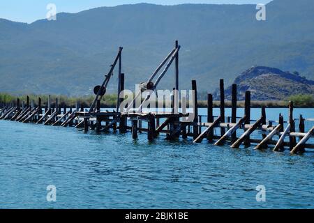 Fencing of fish farm on river Stock Photo - Alamy