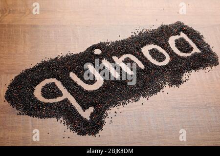 Word QUINOA written on scattered seeds Stock Photo - Alamy