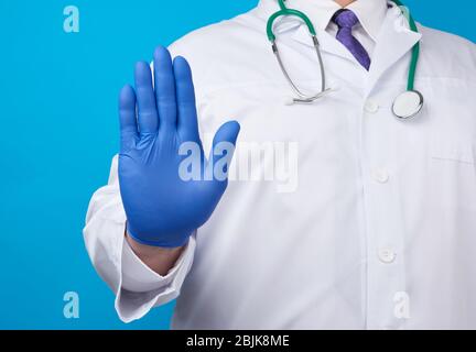 Image of medical nurse showing stop sign Stock Photo - Alamy