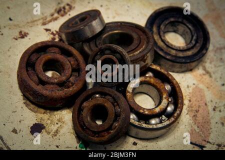 Used rusty metal ball bearing, isolated. Made in USSR Stock Photo - Alamy