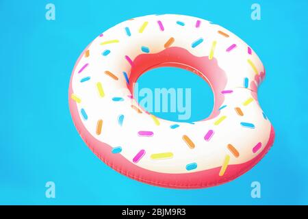 Rubber Lilo floating in a swimming pool Stock Photo - Alamy
