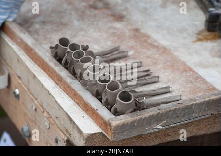 Hand made traditional clay pipes for smokers in a workshop's of Wilson ...