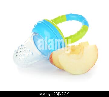 Baby's nibbler and ripe apple on white background Stock Photo - Alamy