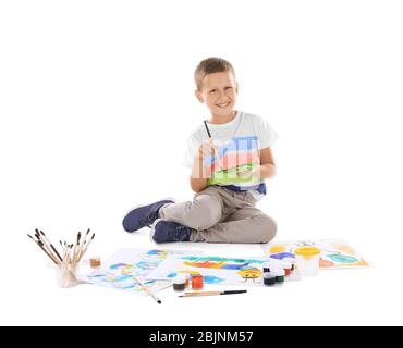 Talented boy painting against white background Stock Photo - Alamy