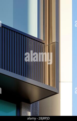 Detail of metal bronze anodized cladding around the glazing. 75 ...
