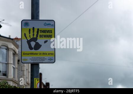 Thieves Beware Smart Water sign Stock Photo - Alamy