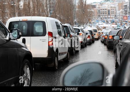 KYIV, UKRAINE - DECEMBER 19, 2017: Cars in traffic jam on city road ...