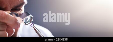 Inspecting a Diamond Stock Photo - Alamy