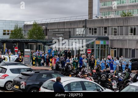 MERTHYR TYDFIL, WALES - 30 APRIL 2020 - NHS staff member smiles as he ...